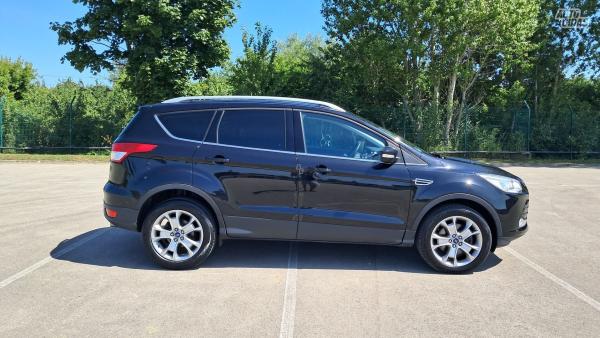 Black Ford Kuga 2014 in Klaipeda, with an engine capacity of 2.00 L and mileage of 261 thousand km for 6920 €, photo 6 on AUTOMOTO.COM.LV