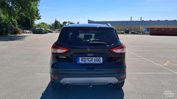 Black Ford Kuga 2014 in Klaipeda, with an engine capacity of 2.00 L and mileage of 261 thousand km for 6920 €, photo 8 on AUTOMOTO.COM.LV
