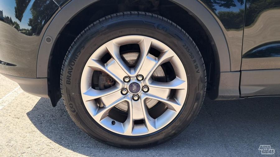 Black Ford Kuga 2014 in Klaipeda, with an engine capacity of 2.00 L and mileage of 261 thousand km for 6920 €, photo 13 on AUTOMOTO.COM.LV