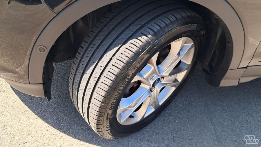 Black Ford Kuga 2014 in Klaipeda, with an engine capacity of 2.00 L and mileage of 261 thousand km for 6920 €, photo 14 on AUTOMOTO.COM.LV