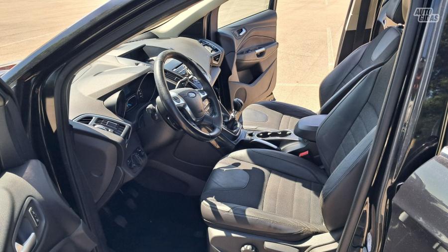 Black Ford Kuga 2014 in Klaipeda, with an engine capacity of 2.00 L and mileage of 261 thousand km for 6920 €, photo 15 on AUTOMOTO.COM.LV