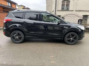 Black Ford Kuga 2015 in Kaunas, with an engine capacity of 2.00 L and mileage of 180 thousand km for 7500 €, photo 2 on AUTOMOTO.COM.LV