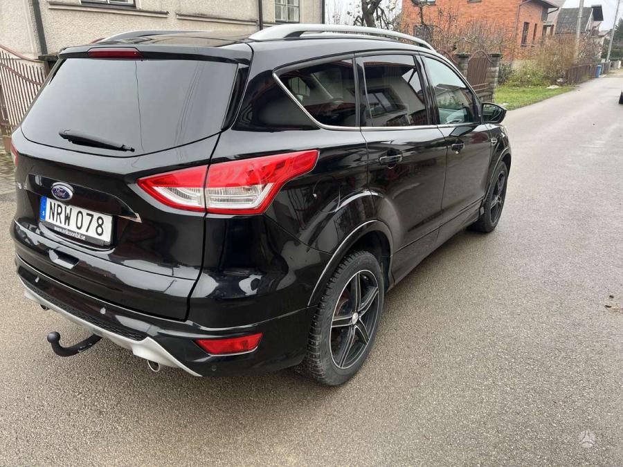 Black Ford Kuga 2015 in Kaunas, with an engine capacity of 2.00 L and mileage of 180 thousand km for 7500 €, photo 5 on AUTOMOTO.COM.LV