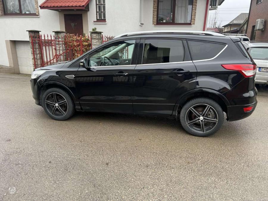Black Ford Kuga 2015 in Kaunas, with an engine capacity of 2.00 L and mileage of 180 thousand km for 7500 €, photo 8 on AUTOMOTO.COM.LV