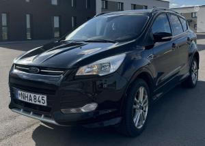 Black Ford Kuga 2015 in Kaunas, with an engine capacity of 2.00 L and mileage of 334 thousand km for 6999 €, photo 2 on AUTOMOTO.COM.LV