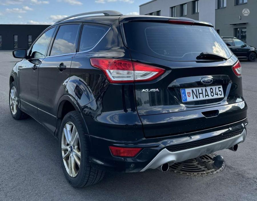 Black Ford Kuga 2015 in Kaunas, with an engine capacity of 2.00 L and mileage of 334 thousand km for 6999 €, photo 4 on AUTOMOTO.COM.LV
