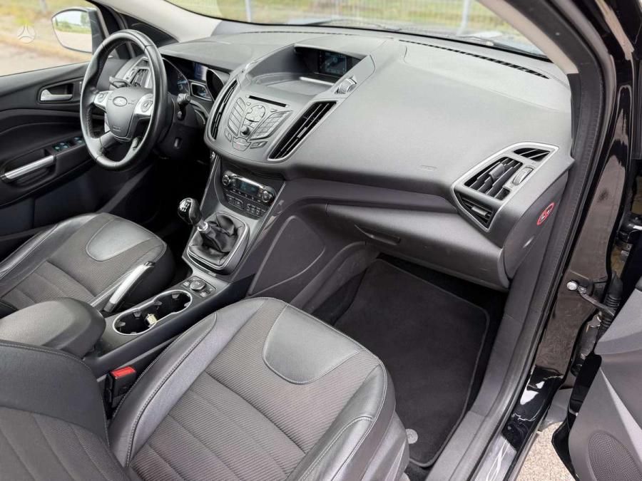 Black Ford Kuga 2015 in Marijampole, with an engine capacity of 1.50 L and mileage of 143 thousand km for 6750 €, photo 9 on AUTOMOTO.COM.LV