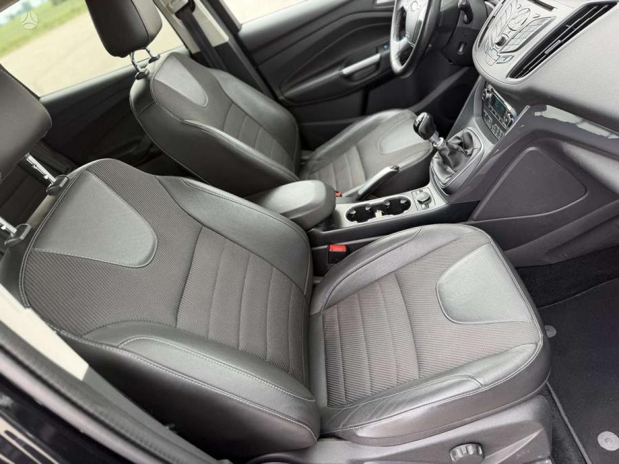 Black Ford Kuga 2015 in Marijampole, with an engine capacity of 1.50 L and mileage of 143 thousand km for 6750 €, photo 11 on AUTOMOTO.COM.LV