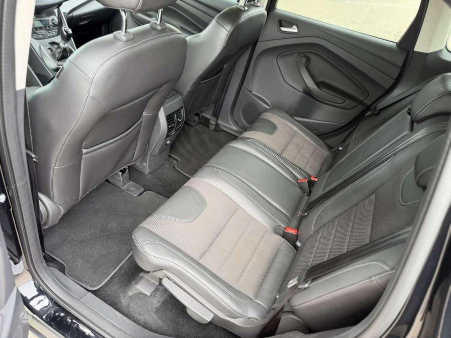 Black Ford Kuga 2015 in Marijampole, with an engine capacity of 1.50 L and mileage of 143 thousand km for 6750 €, photo 12 on AUTOMOTO.COM.LV