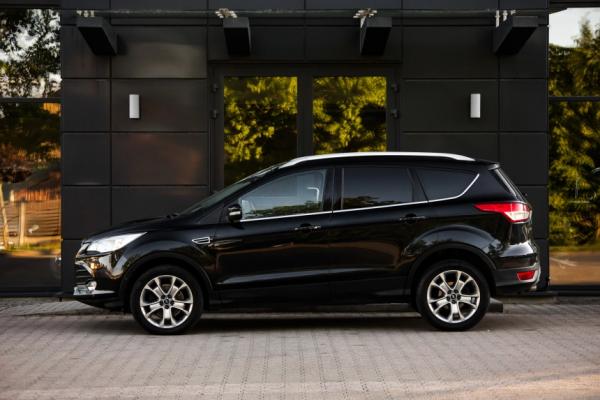Black Ford Kuga 2015 in Riga, with an engine capacity of 2.00 L and mileage of 247 thousand km for 9990 €, photo 10 on AUTOMOTO.COM.LV