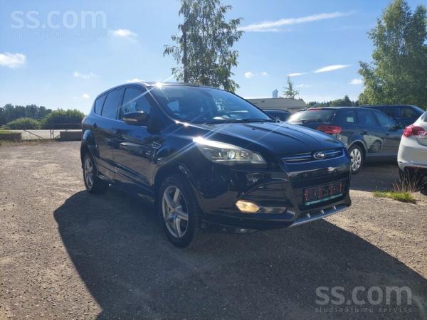 Black Ford Kuga 2015 in Cesis, with an engine capacity of 2.00 L and mileage of 208 thousand km for 9200 €, photo 2 on AUTOMOTO.COM.LV