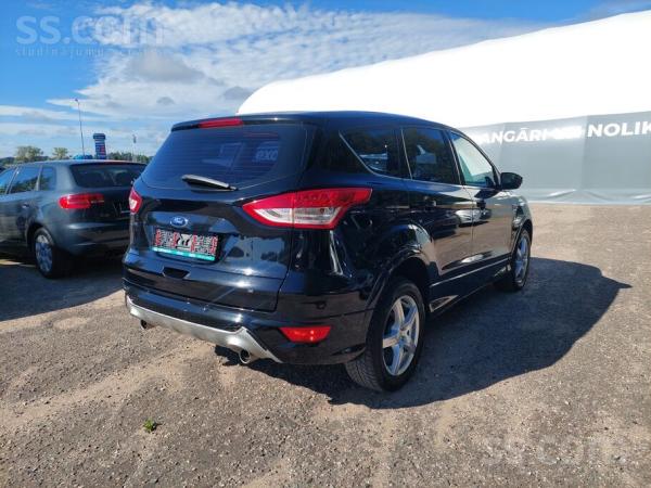 Black Ford Kuga 2015 in Cesis, with an engine capacity of 2.00 L and mileage of 208 thousand km for 9200 €, photo 3 on AUTOMOTO.COM.LV