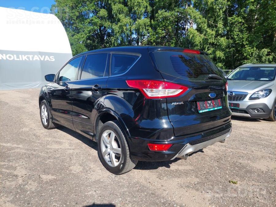 Black Ford Kuga 2015 in Cesis, with an engine capacity of 2.00 L and mileage of 208 thousand km for 9200 €, photo 5 on AUTOMOTO.COM.LV