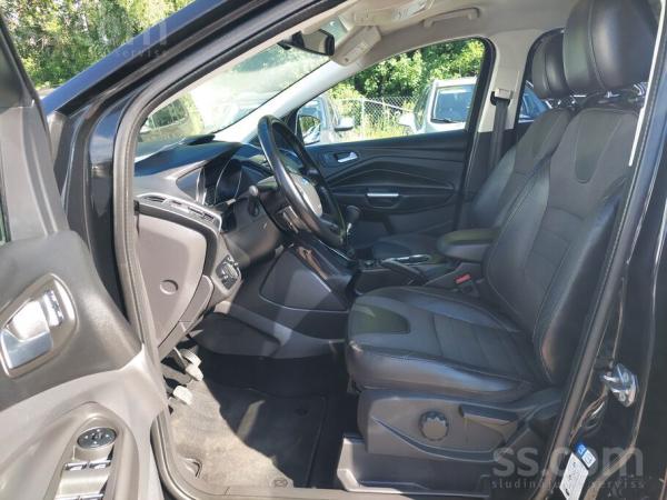 Black Ford Kuga 2015 in Cesis, with an engine capacity of 2.00 L and mileage of 208 thousand km for 9200 €, photo 6 on AUTOMOTO.COM.LV