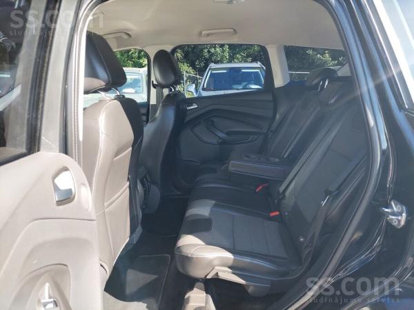 Black Ford Kuga 2015 in Cesis, with an engine capacity of 2.00 L and mileage of 208 thousand km for 9200 €, photo 7 on AUTOMOTO.COM.LV
