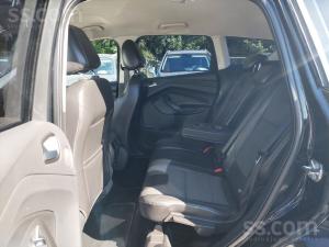 Black Ford Kuga 2015 in Cesis, with an engine capacity of 2.00 L and mileage of 208 thousand km for 9200 €, photo 8 on AUTOMOTO.COM.LV