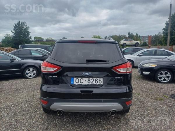 Black Ford Kuga 2015 in Daugavpils, with an engine capacity of 2.00 L and mileage of 0 thousand km for 12600 €, photo 6 on AUTOMOTO.COM.LV