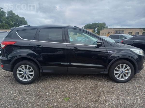 Black Ford Kuga 2015 in Daugavpils, with an engine capacity of 2.00 L and mileage of 0 thousand km for 12600 €, photo 8 on AUTOMOTO.COM.LV