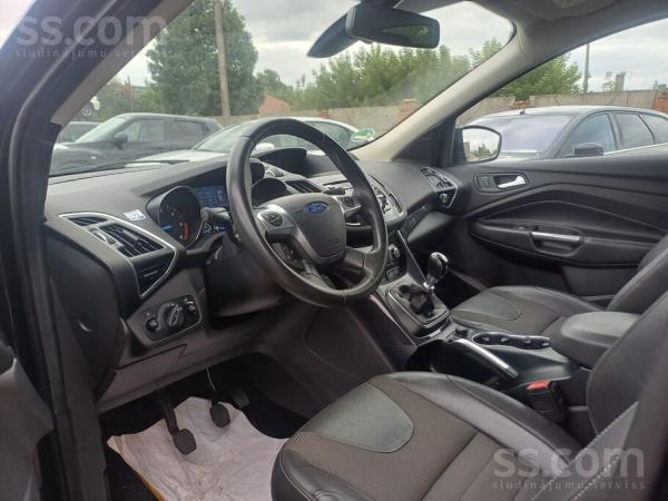 Black Ford Kuga 2015 in Daugavpils, with an engine capacity of 2.00 L and mileage of 0 thousand km for 12600 €, photo 10 on AUTOMOTO.COM.LV