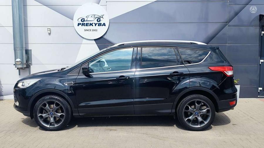 Black Ford Kuga 2015 in Kaunas, with an engine capacity of 2.00 L and mileage of 223 thousand km for 7250 €, photo 7 on AUTOMOTO.COM.LV