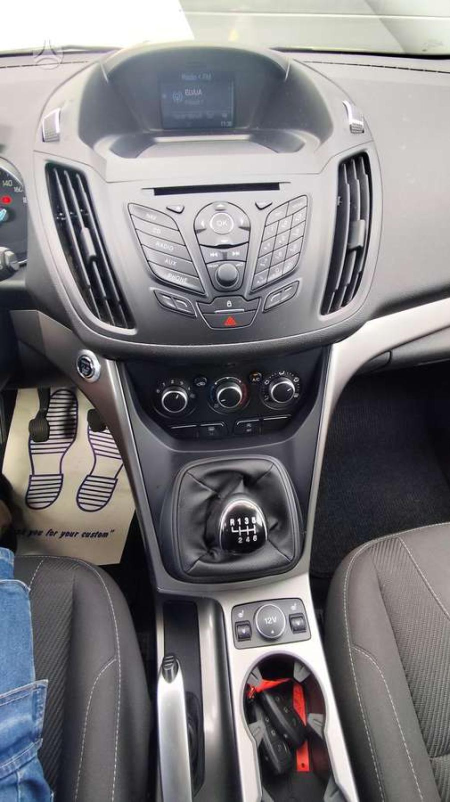 Black Ford Kuga 2015 in Kaunas, with an engine capacity of 2.00 L and mileage of 223 thousand km for 7250 €, photo 16 on AUTOMOTO.COM.LV