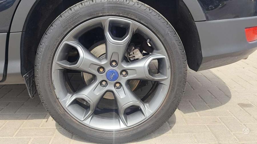 Black Ford Kuga 2015 in Kaunas, with an engine capacity of 2.00 L and mileage of 223 thousand km for 7250 €, photo 24 on AUTOMOTO.COM.LV