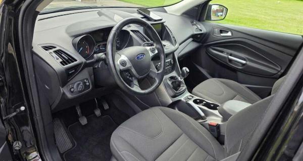 Black Ford Kuga 2015 in Siauliai, with an engine capacity of 2.00 L and mileage of 167 thousand km for 8300 €, photo 6 on AUTOMOTO.COM.LV