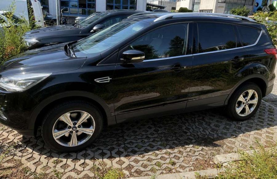 Black Ford Kuga 2015 in Kaunas, with an engine capacity of 2.00 L and mileage of 150 thousand km for 8950 €, photo 3 on AUTOMOTO.COM.LV