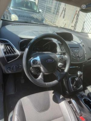 Black Ford Kuga 2015 in Kaunas, with an engine capacity of 2.00 L and mileage of 150 thousand km for 8950 €, photo 6 on AUTOMOTO.COM.LV