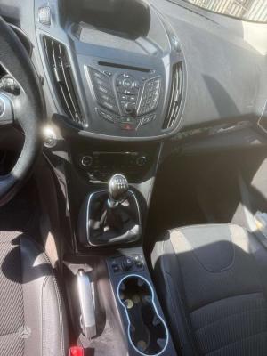 Black Ford Kuga 2015 in Kaunas, with an engine capacity of 2.00 L and mileage of 150 thousand km for 8950 €, photo 7 on AUTOMOTO.COM.LV