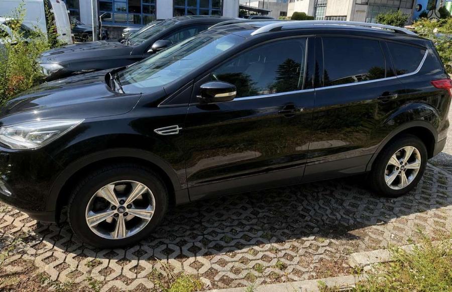 Black Ford Kuga 2015 in Kaunas, with an engine capacity of 2.00 L and mileage of 150 thousand km for 8950 €, photo 3 on AUTOMOTO.COM.LV