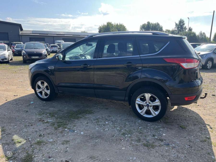 Black Ford Kuga 2015 in Taurage, with an engine capacity of 2.00 L and mileage of 226 thousand km for 4700 €, photo 14 on AUTOMOTO.COM.LV