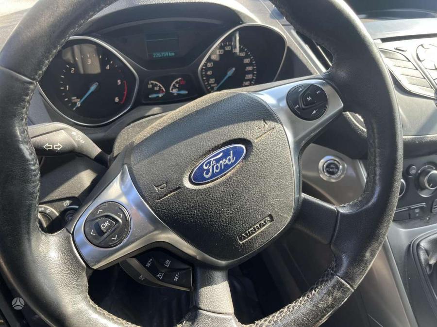 Black Ford Kuga 2015 in Taurage, with an engine capacity of 2.00 L and mileage of 226 thousand km for 4700 €, photo 17 on AUTOMOTO.COM.LV