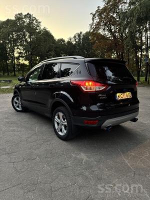 Black Ford Kuga 2015 in Riga, with an engine capacity of 2.00 L and mileage of 115 thousand km for 9500 €, photo 3 on AUTOMOTO.COM.LV
