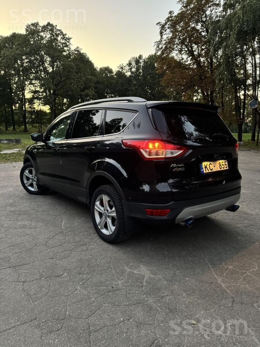 Black Ford Kuga 2015 in Riga, with an engine capacity of 2.00 L and mileage of 115 thousand km for 9500 €, photo 3 on AUTOMOTO.COM.LV