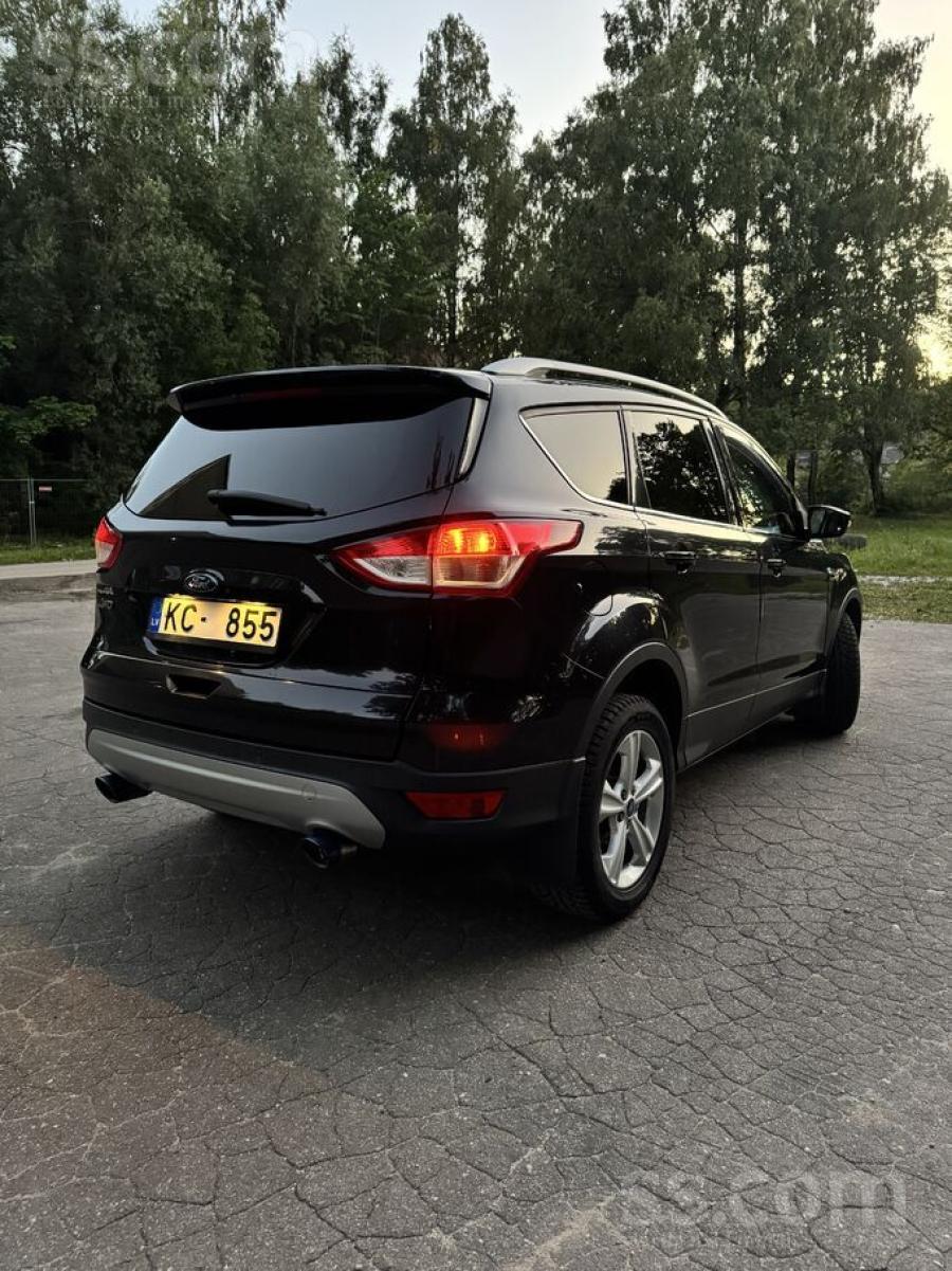 Black Ford Kuga 2015 in Riga, with an engine capacity of 2.00 L and mileage of 115 thousand km for 9500 €, photo 4 on AUTOMOTO.COM.LV