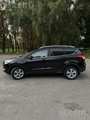 Black Ford Kuga 2015 in Riga, with an engine capacity of 2.00 L and mileage of 115 thousand km for 9500 €, photo 5 on AUTOMOTO.COM.LV