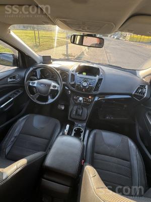 Black Ford Kuga 2015 in Riga, with an engine capacity of 2.00 L and mileage of 115 thousand km for 9500 €, photo 8 on AUTOMOTO.COM.LV