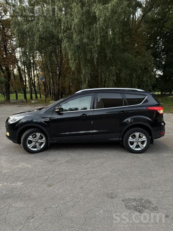 Black Ford Kuga 2015 in Riga, with an engine capacity of 2.00 L and mileage of 115 thousand km for 9500 €, photo 5 on AUTOMOTO.COM.LV