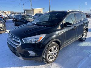Black Ford Kuga 2016 in Panevezys, with an engine capacity of 1.50 L and mileage of 189 thousand km for 8200 €, photo  on AUTOMOTO.COM.LV