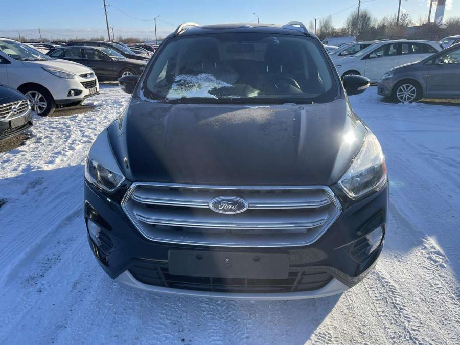 Black Ford Kuga 2016 in Panevezys, with an engine capacity of 1.50 L and mileage of 189 thousand km for 8200 €, photo 2 on AUTOMOTO.COM.LV
