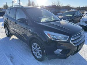 Black Ford Kuga 2016 in Panevezys, with an engine capacity of 1.50 L and mileage of 189 thousand km for 8200 €, photo 3 on AUTOMOTO.COM.LV