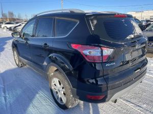 Black Ford Kuga 2016 in Panevezys, with an engine capacity of 1.50 L and mileage of 189 thousand km for 8200 €, photo 6 on AUTOMOTO.COM.LV