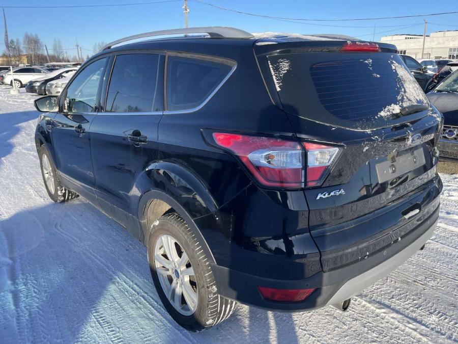 Black Ford Kuga 2016 in Panevezys, with an engine capacity of 1.50 L and mileage of 189 thousand km for 8200 €, photo 6 on AUTOMOTO.COM.LV