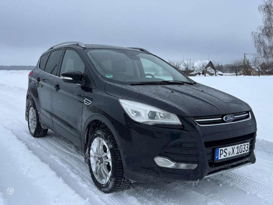 Black Ford Kuga 2016 in Panevezys, with an engine capacity of 2.00 L and mileage of 205 thousand km for 8400 €, photo 1 on AUTOMOTO.COM.LV