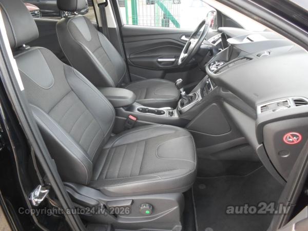 Black Ford Kuga 2016 in Viljandi, with an engine capacity of 2.00 L and mileage of 182 thousand km for 10990 €, photo 11 on AUTOMOTO.COM.LV
