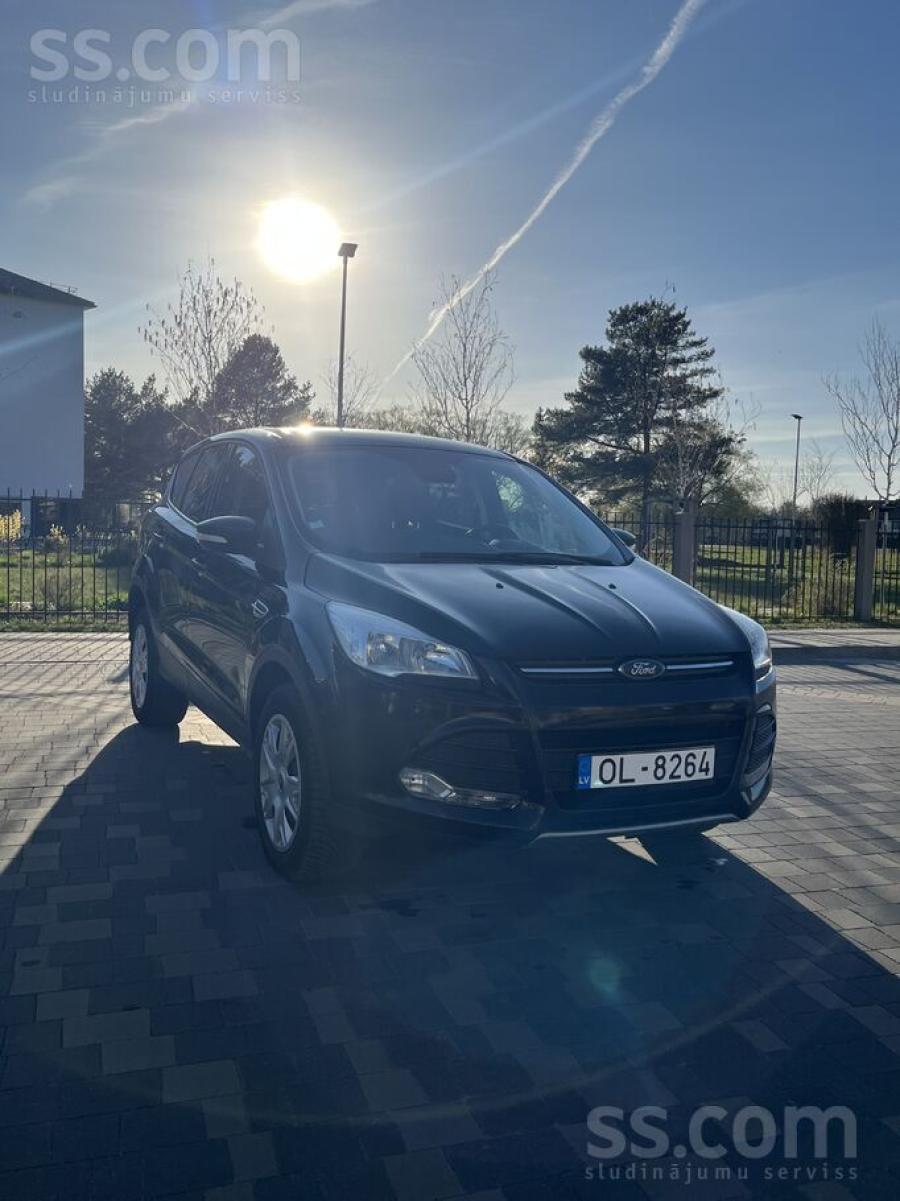 Black Ford Kuga 2016 in Jelgava, with an engine capacity of 2.00 L and mileage of 180 thousand km for 10550 €, photo 1 on AUTOMOTO.COM.LV