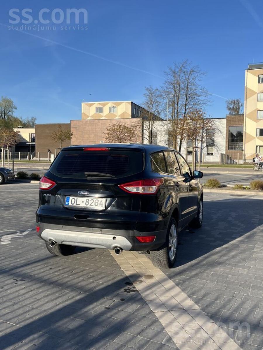Black Ford Kuga 2016 in Jelgava, with an engine capacity of 2.00 L and mileage of 180 thousand km for 10550 €, photo 5 on AUTOMOTO.COM.LV