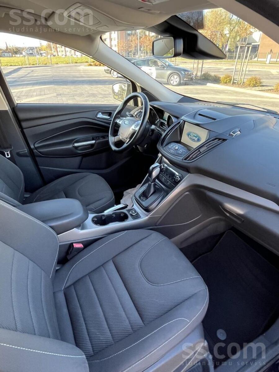 Black Ford Kuga 2016 in Jelgava, with an engine capacity of 2.00 L and mileage of 180 thousand km for 10550 €, photo 7 on AUTOMOTO.COM.LV