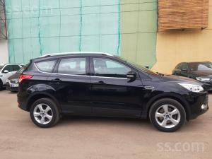 Black Ford Kuga 2016 in Daugavpils, with an engine capacity of 2.00 L and mileage of 0 thousand km for 9650 €, photo 6 on AUTOMOTO.COM.LV